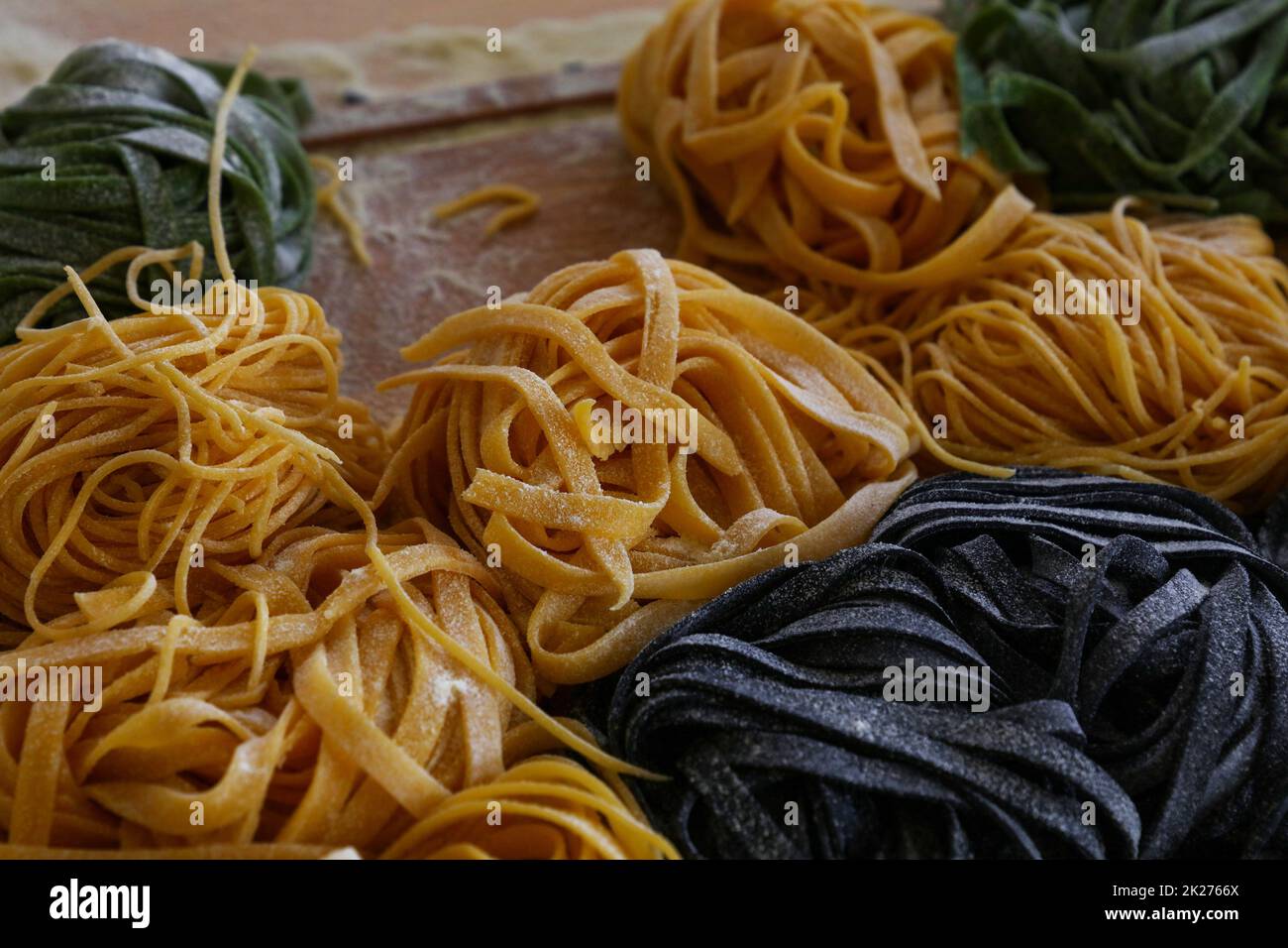 Cooking traditional Italian tagliatelle pasta Stock Photo - Alamy