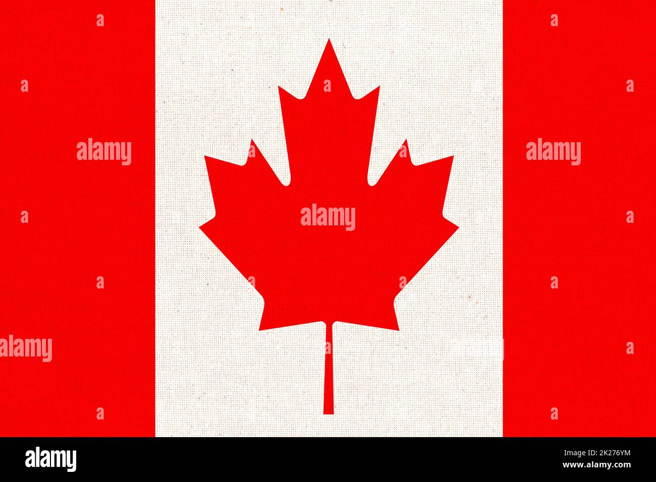 Flag of Canada. Canadian flag on fabric surface with red maple leaf on ...