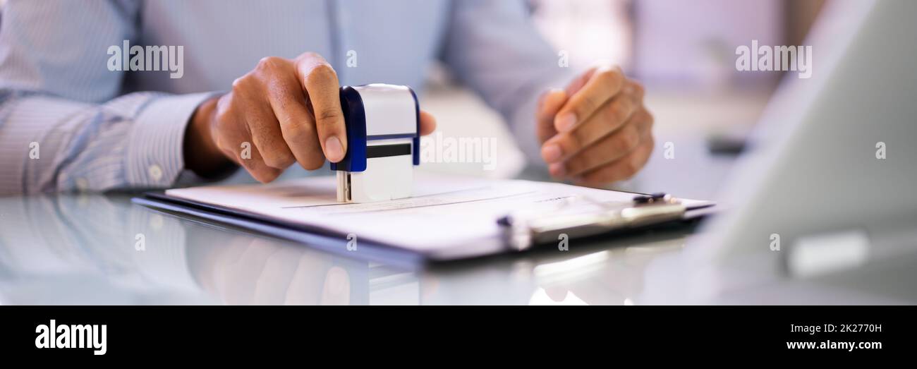 Public Notary Putting Company Stamp On Contract Stock Photo - Alamy