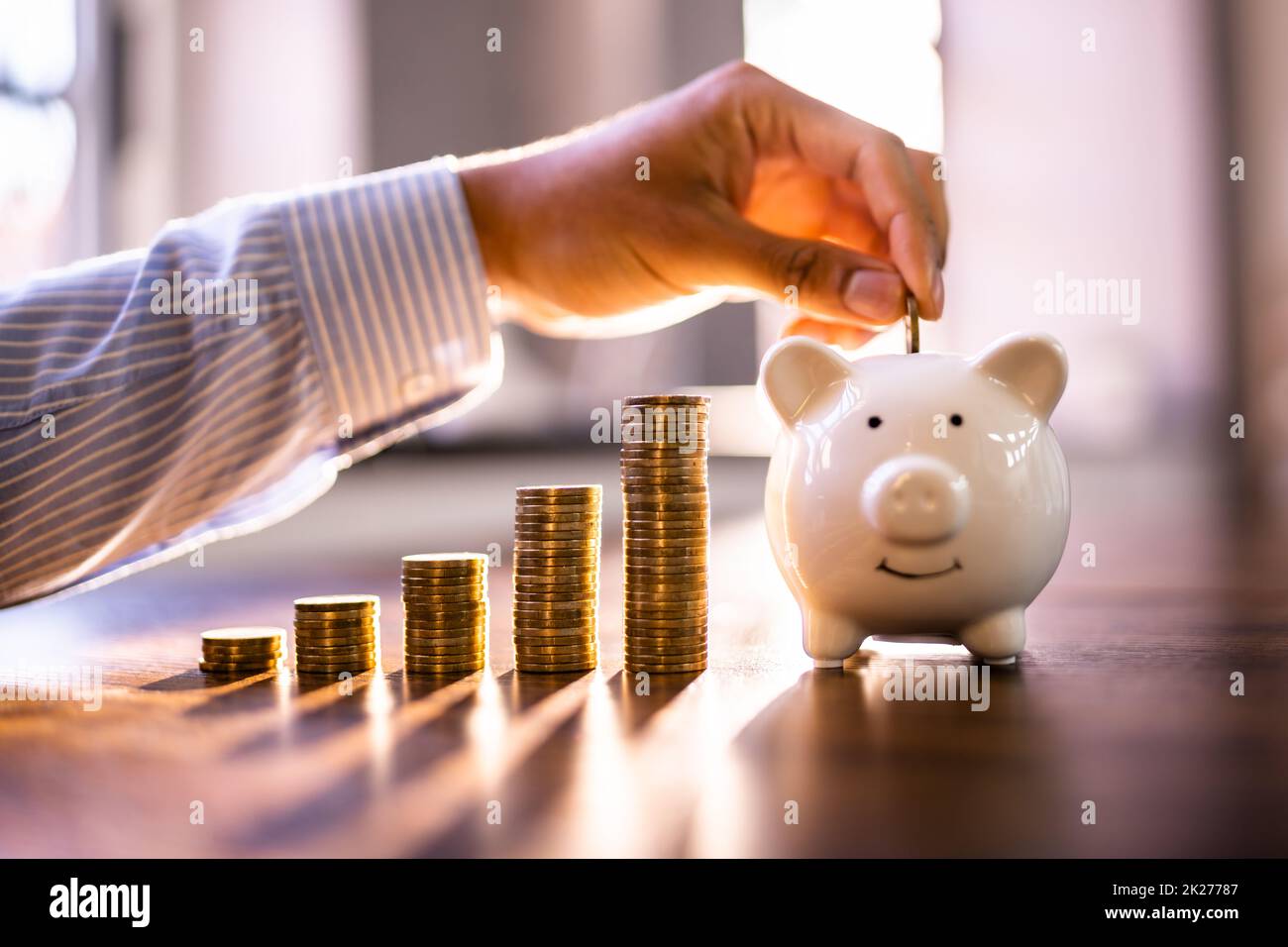 Saving money put in hi-res stock photography and images - Alamy