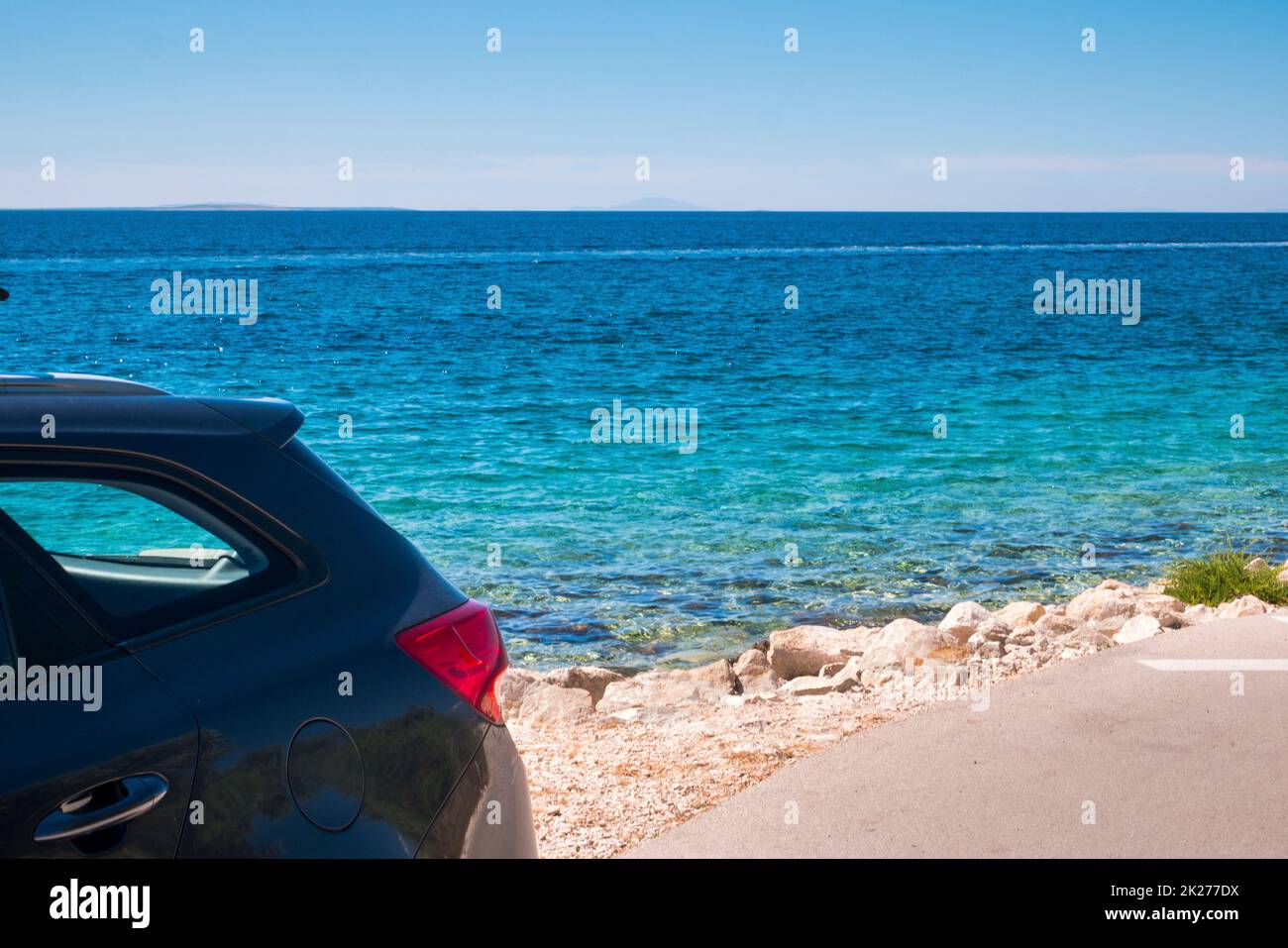Rear side of the car and beautiful clear blue sea Stock Photo - Alamy