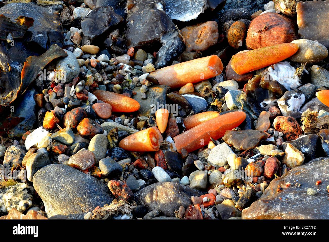 Thunderbolt beach findings sand stones baltic sea Stock Photo - Alamy