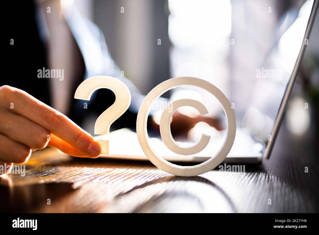 Copyright Sign Near Man's Hand Working Stock Photo - Alamy