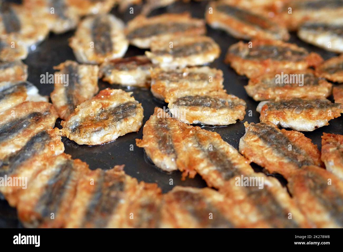 Pan fried anchovy hi-res stock photography and images - Alamy