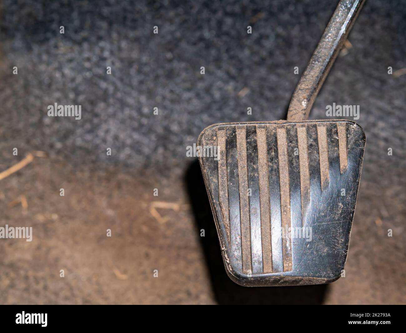 An old car gas pedal with a rubber pad Stock Photo - Alamy