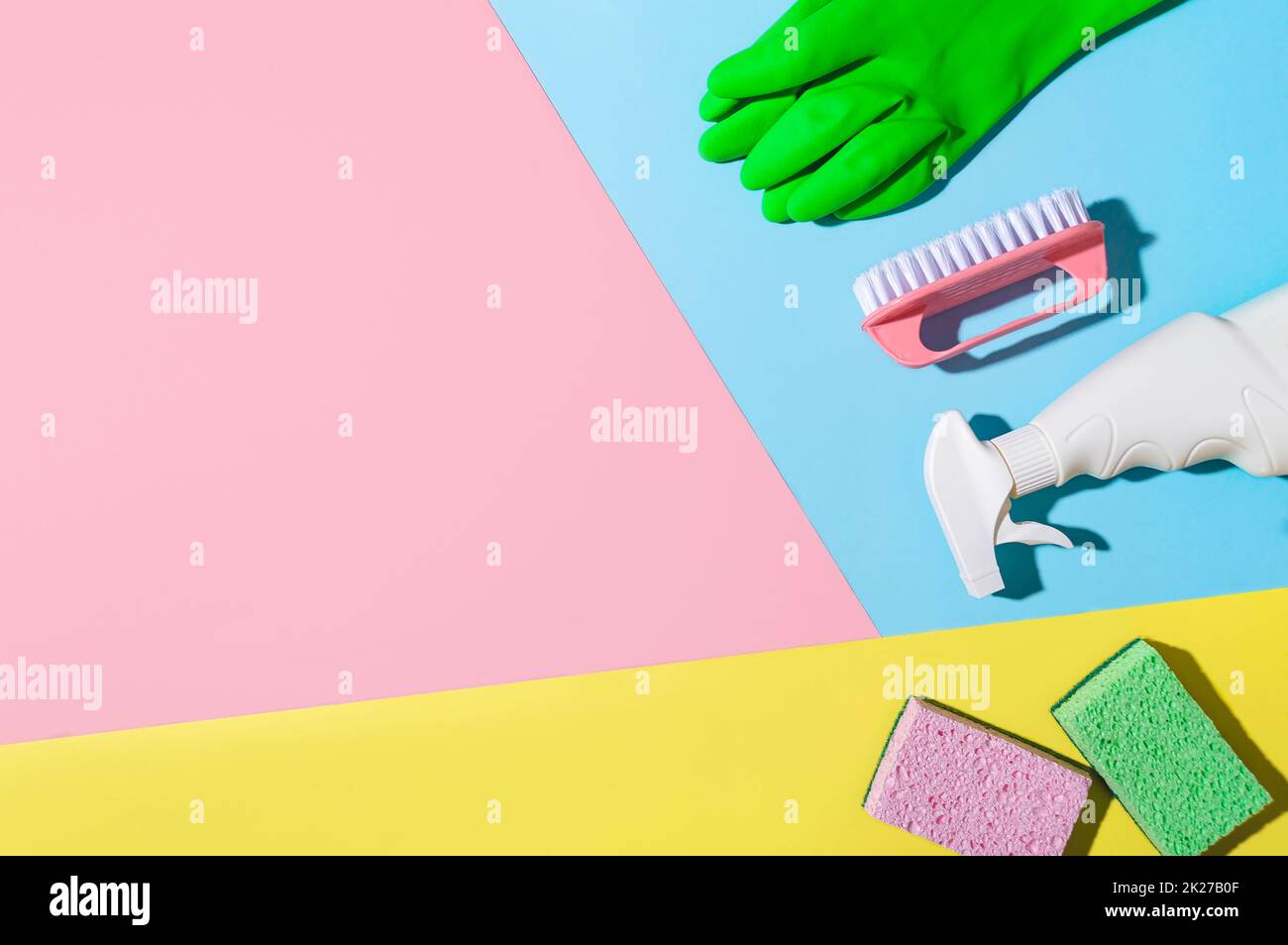 House cleaning product on pink background, copy space Stock Photo - Alamy