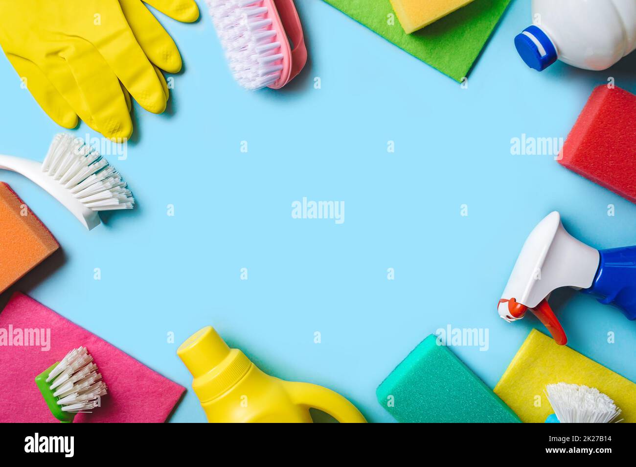 House cleaning product on blue background, copy space Stock Photo - Alamy