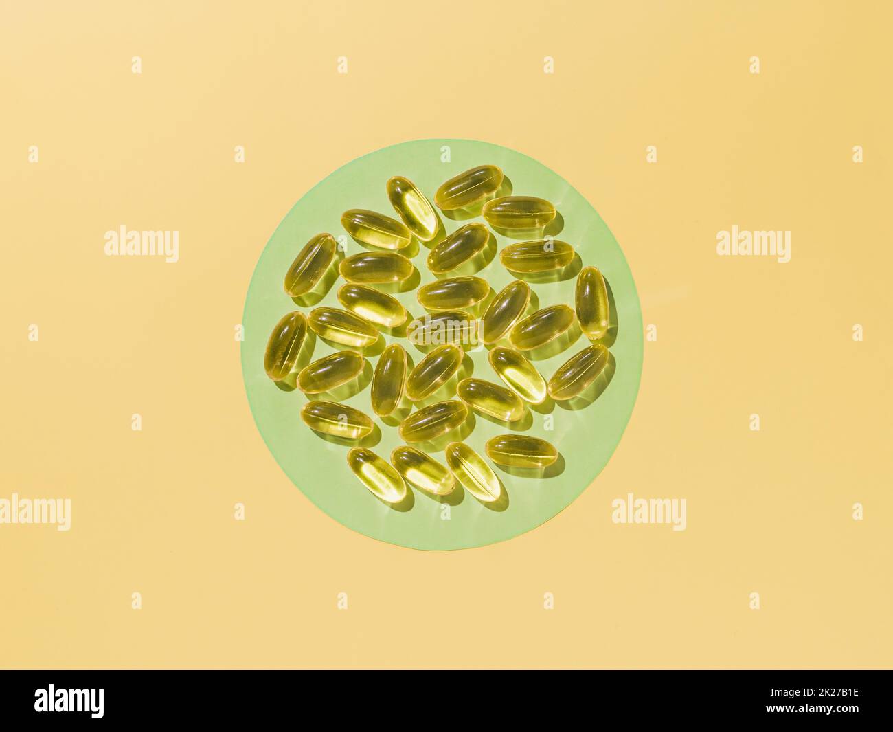 Vitamin D3 or Omega capsules, flat lay Stock Photo - Alamy