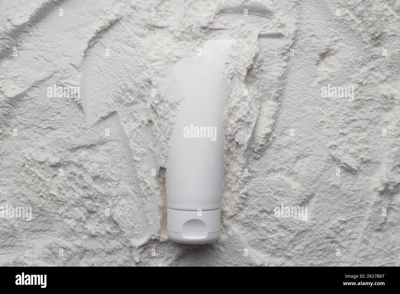 White cosmetics tube mock up on white powder background. Beauty spa ...
