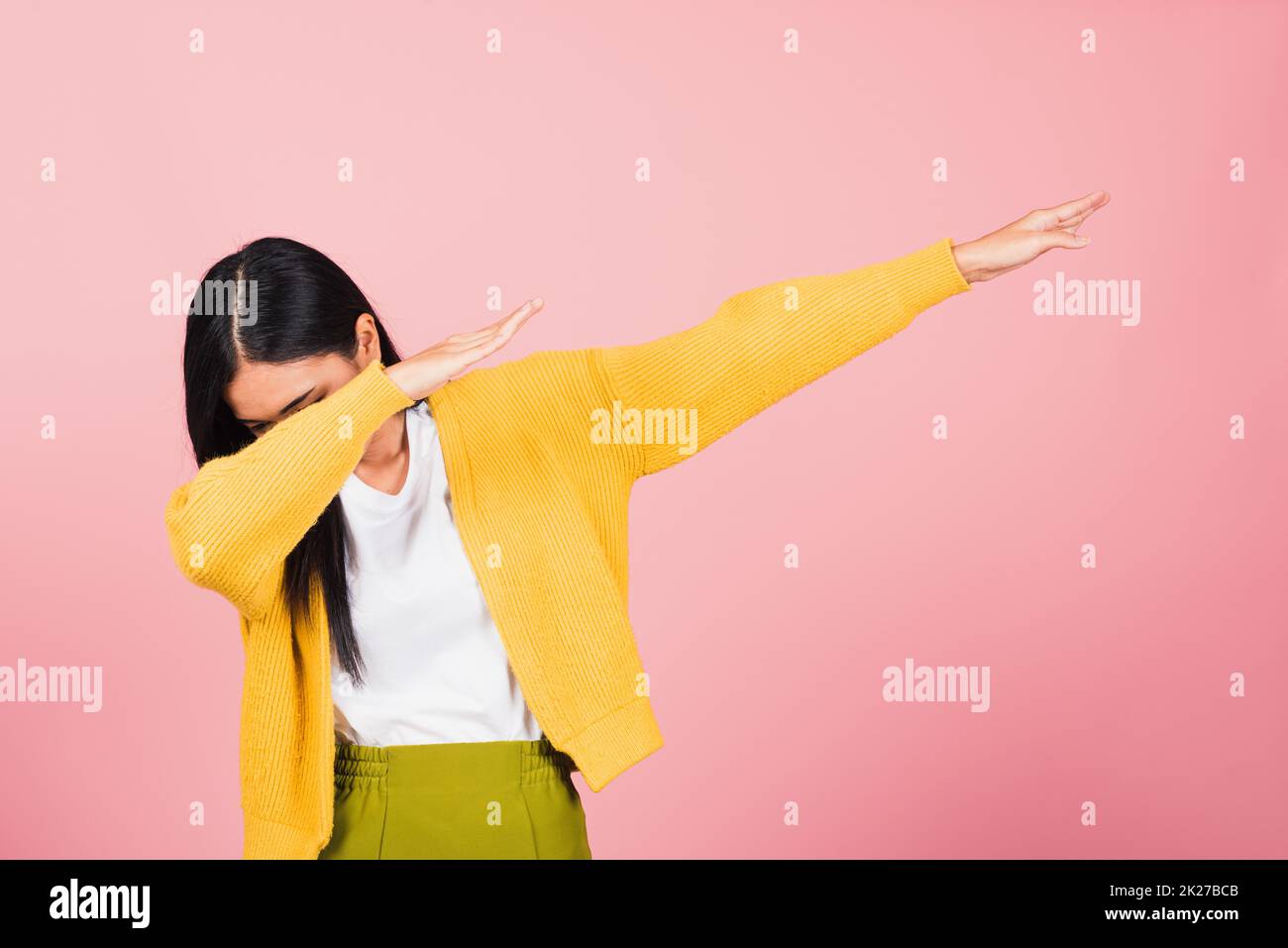 woman teen smile standing move showing DAB dance against gesture Stock ...