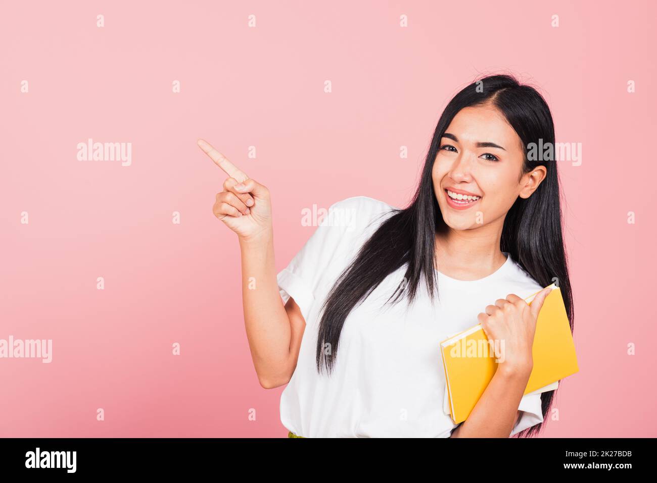 Hands holding up an open book to face hi-res stock photography and ...