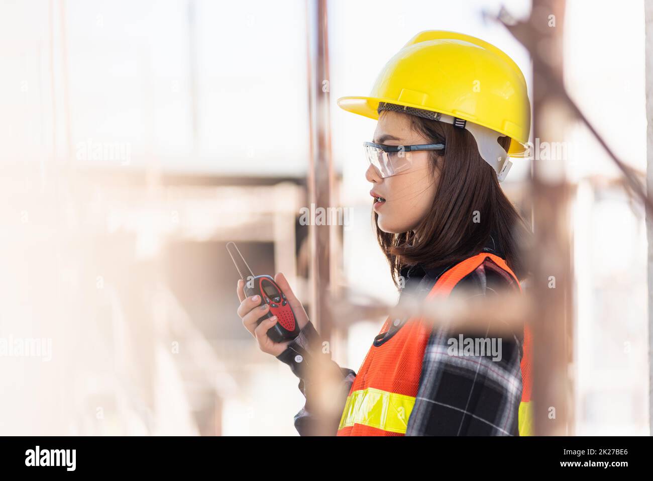 Asian engineer foreman architect worker woman working at building ... Asian engineer foreman architect worker woman working at building ...