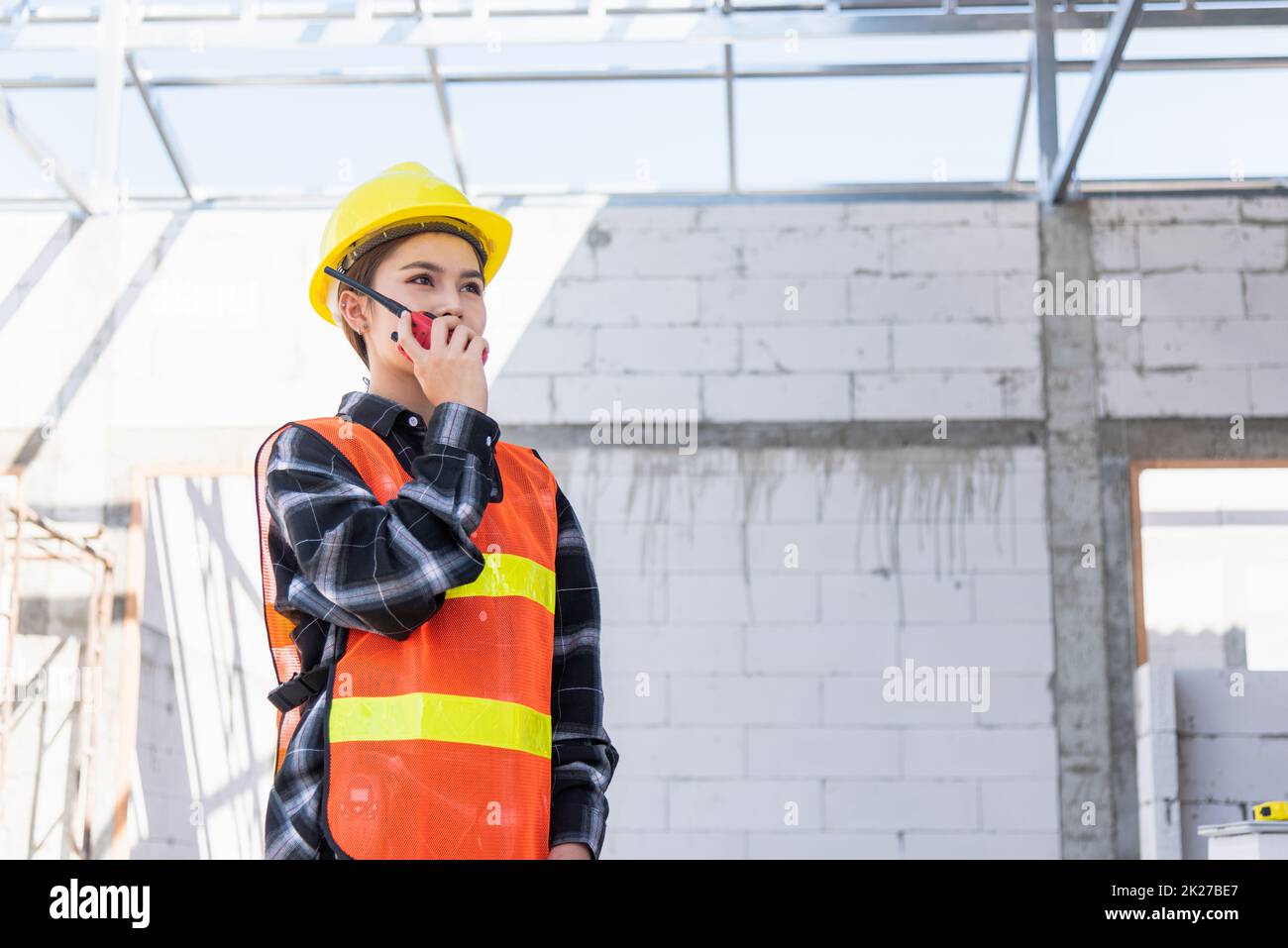 Asian engineer foreman architect worker woman working at building ... Asian engineer foreman architect worker woman working at building ...