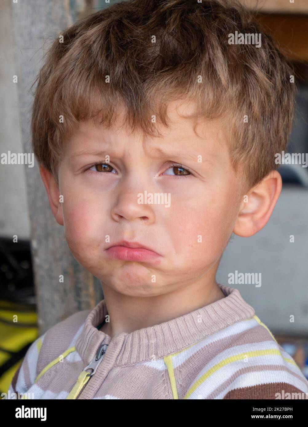 portrait of sad young boy Stock Photo - Alamy