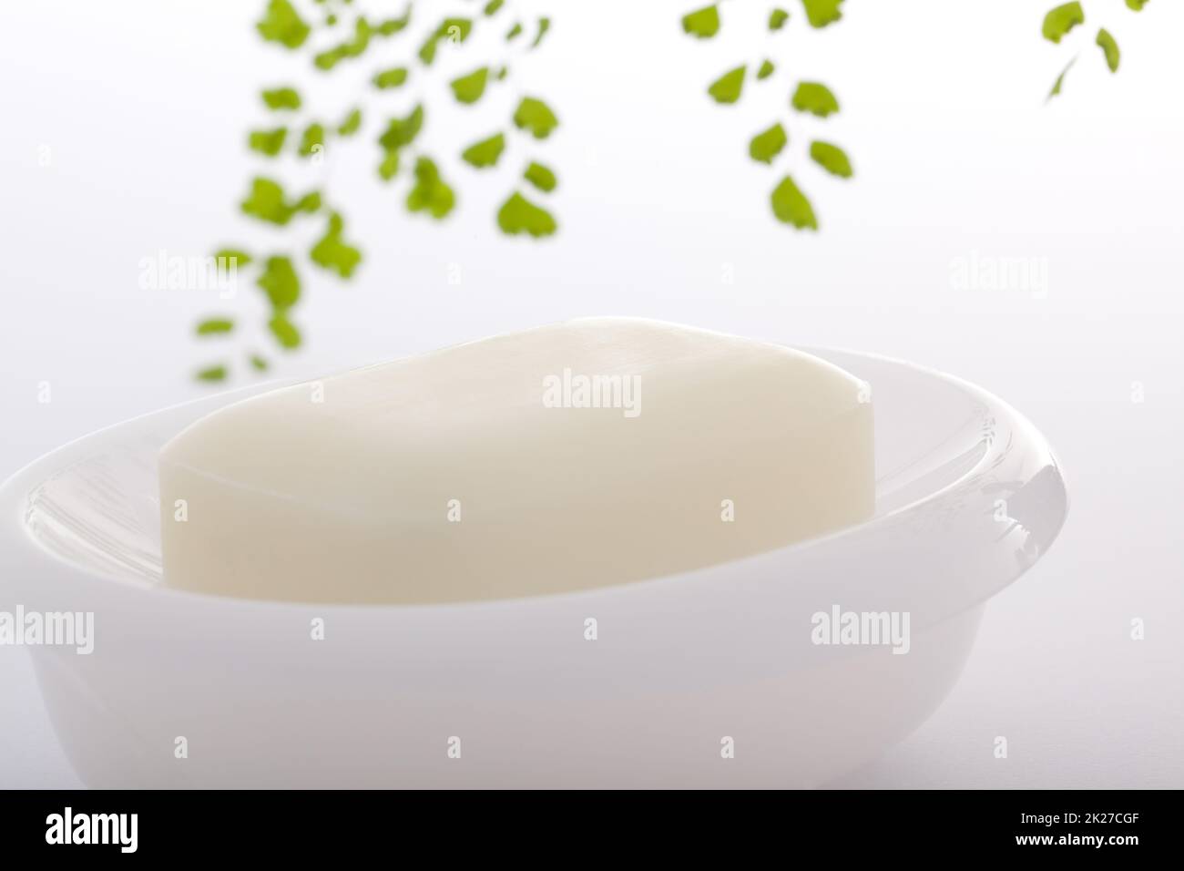 Hand-made soap and sea salt on grey bamboo mat Stock Photo - Alamy