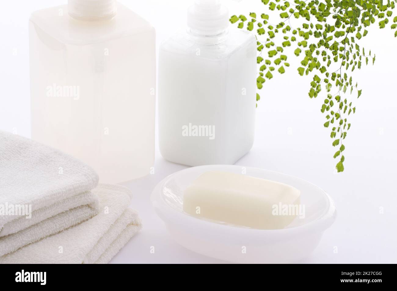 Hand-made soap and sea salt on grey bamboo mat Stock Photo - Alamy