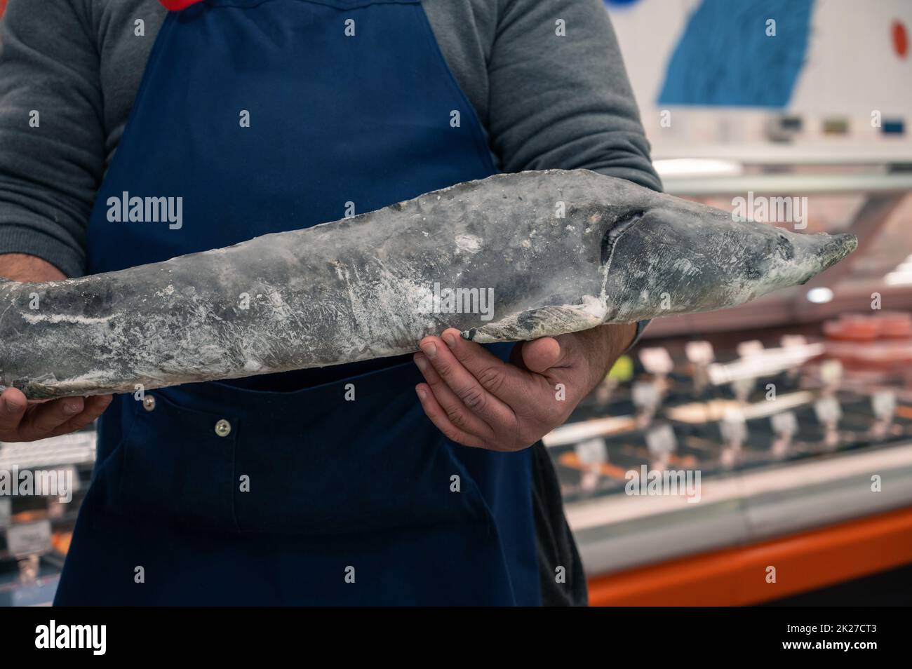 Male fishmonger or fish market worker Stock Photo - Alamy