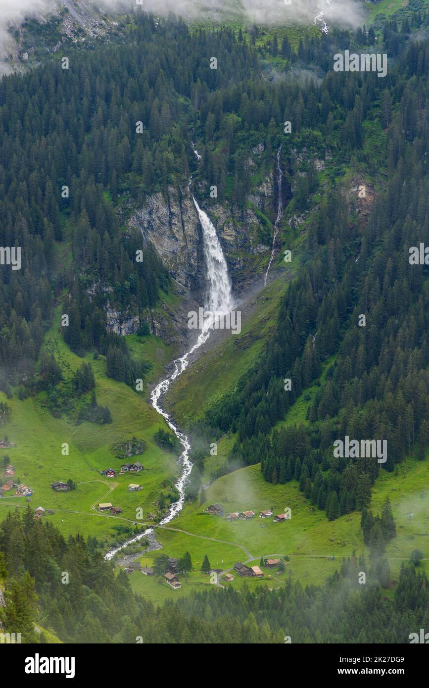 Typical alpine landscape with waterfalls (Niemerstafelbachfall), Swiss ...