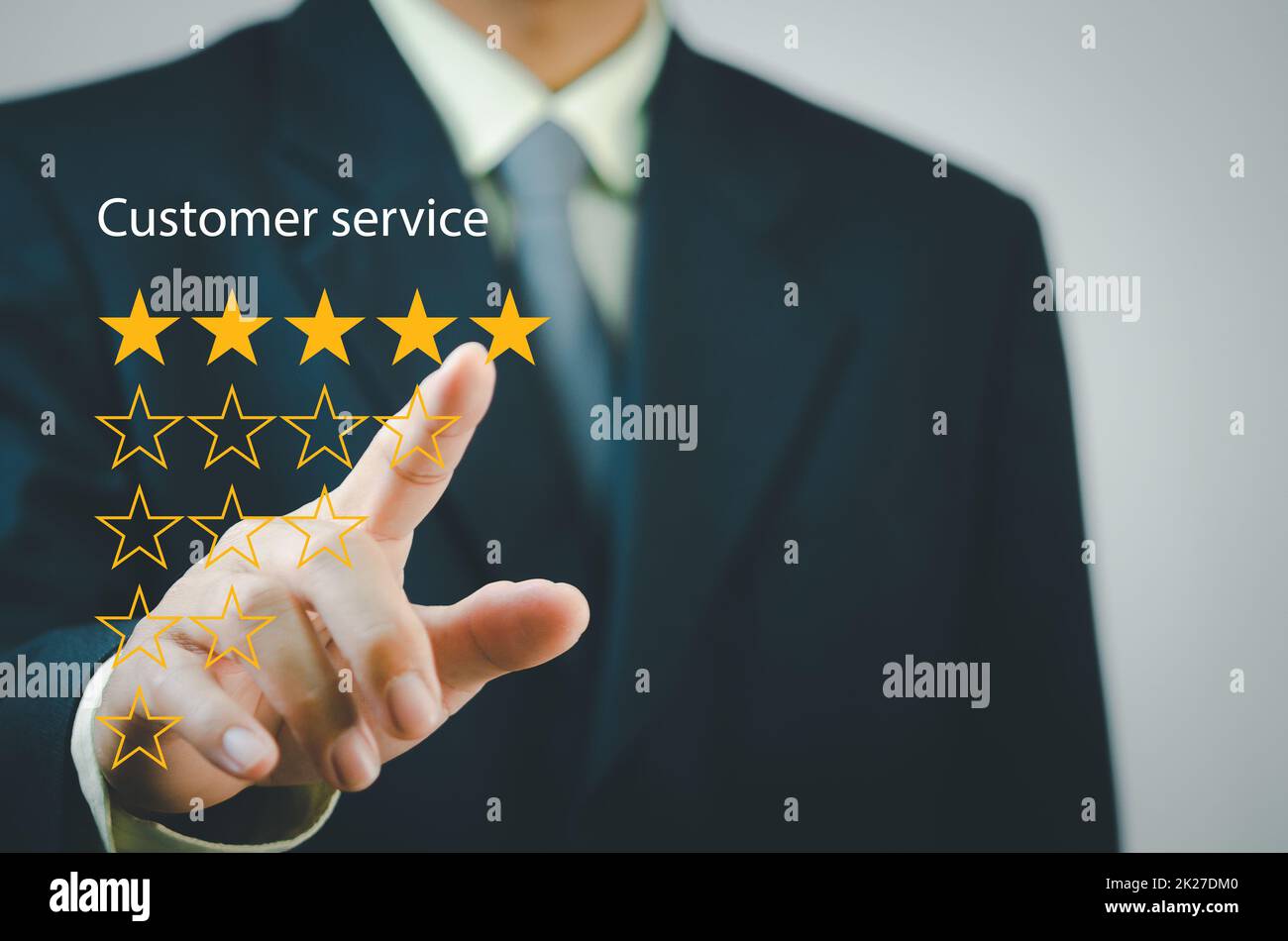 Businessman touching button to select five stars.Customer satisfaction ...