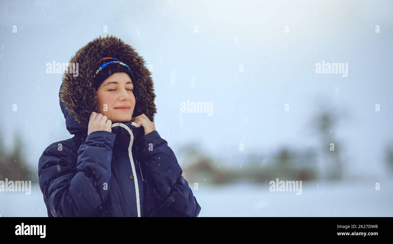 Female Enjoying Snowfall Stock Photo - Alamy