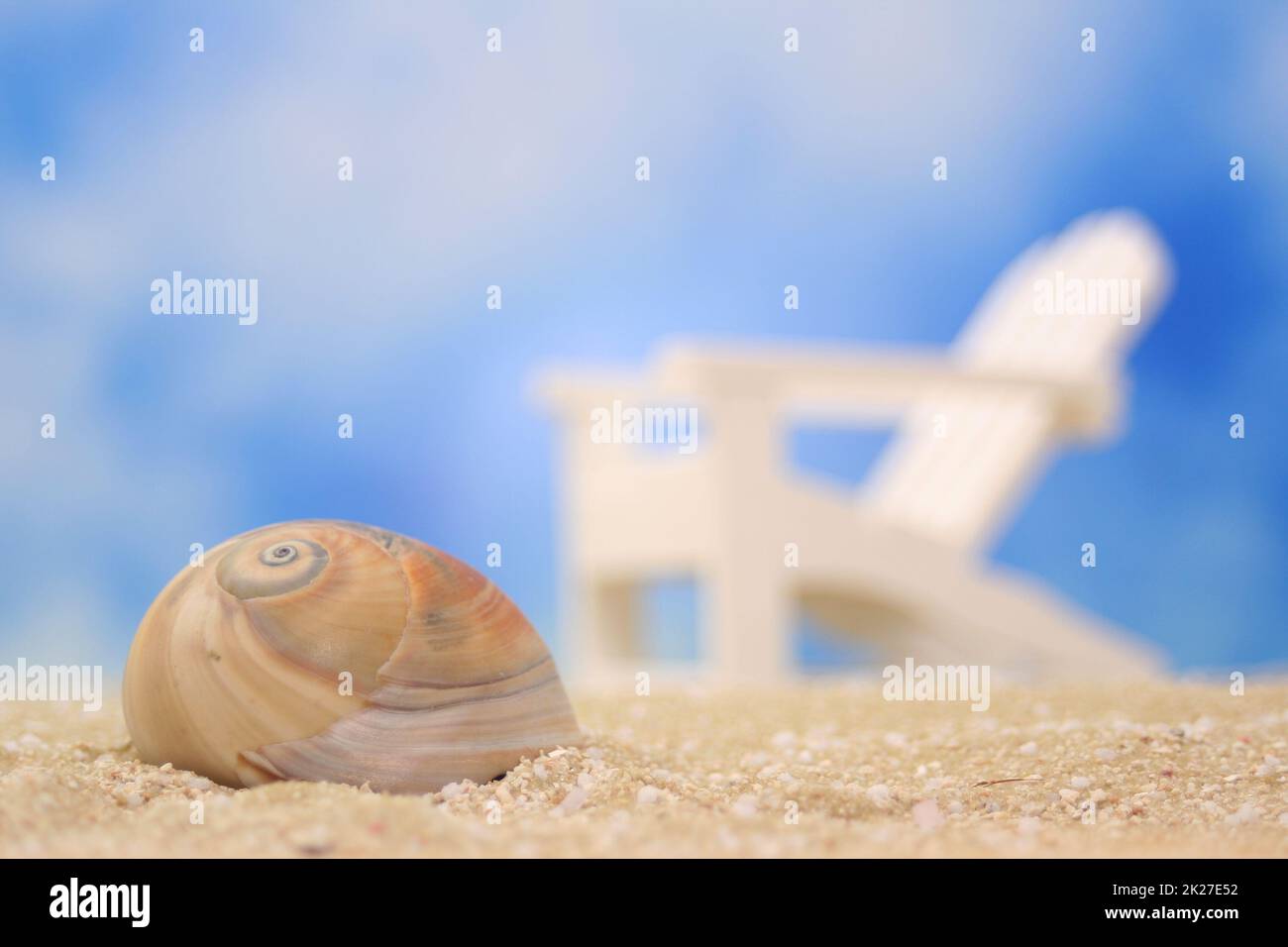 Sea Shell and Beach Chair on beach, Shallow DOF, Focus on Shell Stock ...
