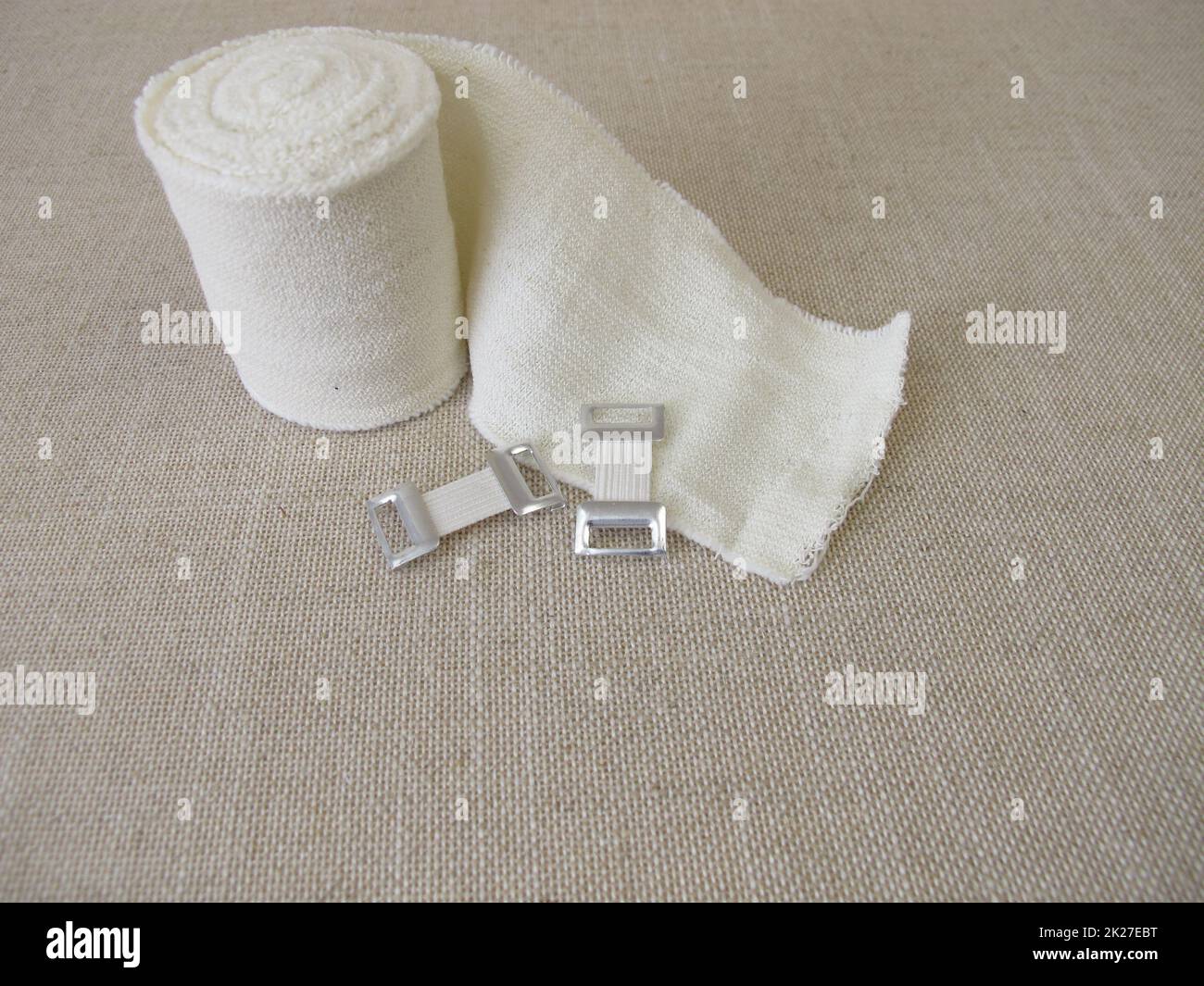 Dressing material, elastic bandage with bandage clamp Stock Photo - Alamy