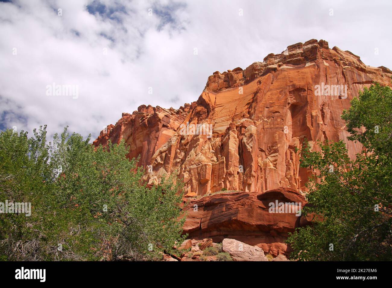 One of the big red cliffs in Fruita in Capitol Reef park Stock Photo ...