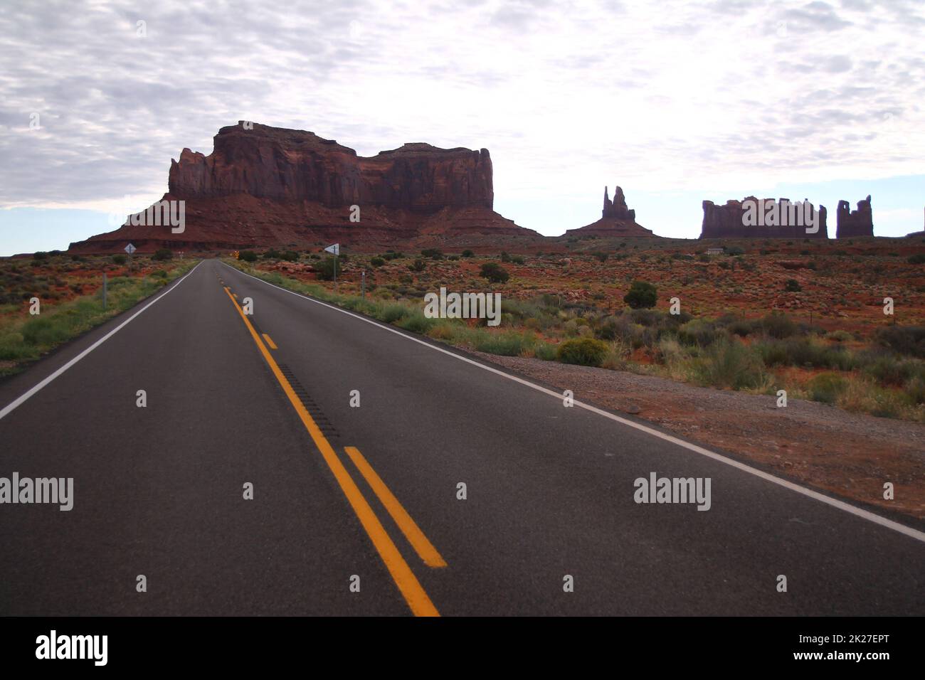 The infinite straight long old road to the Monument Valley Stock Photo ...