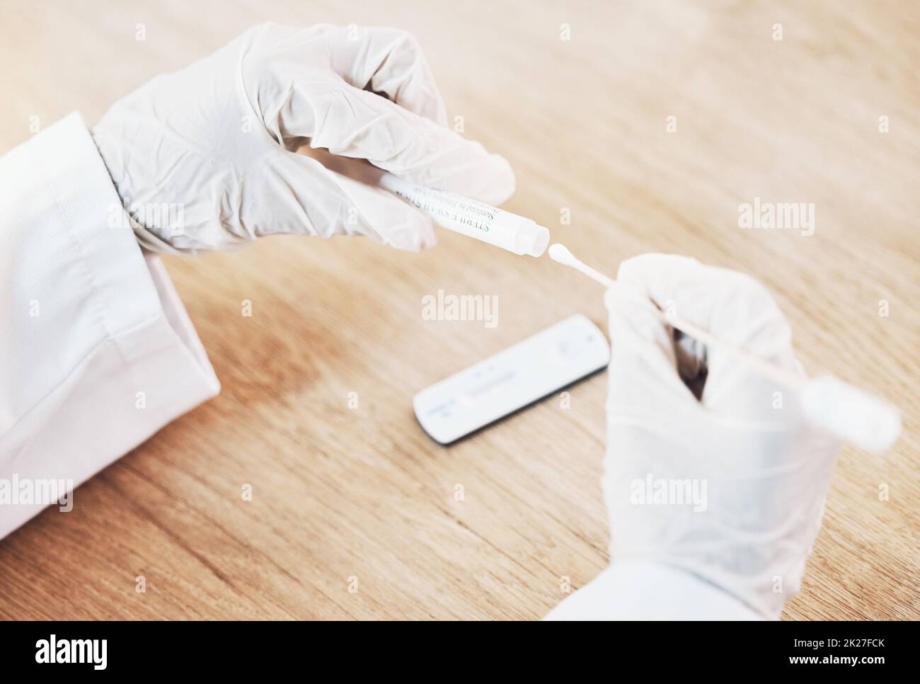 Confident doctor testing sample hi-res stock photography and images - Alamy