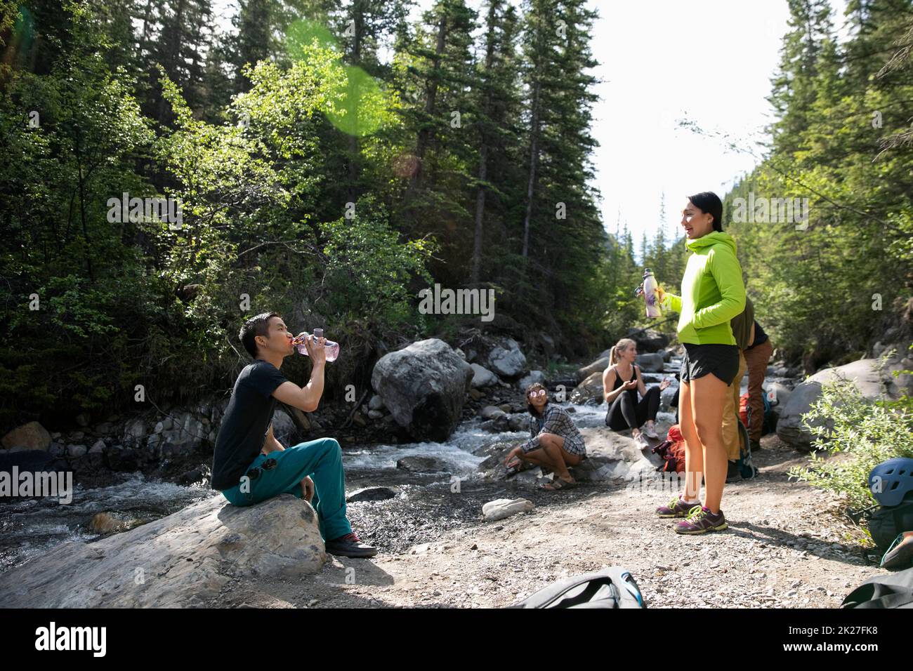 Hikers resting drinking water hi-res stock photography and images - Alamy
