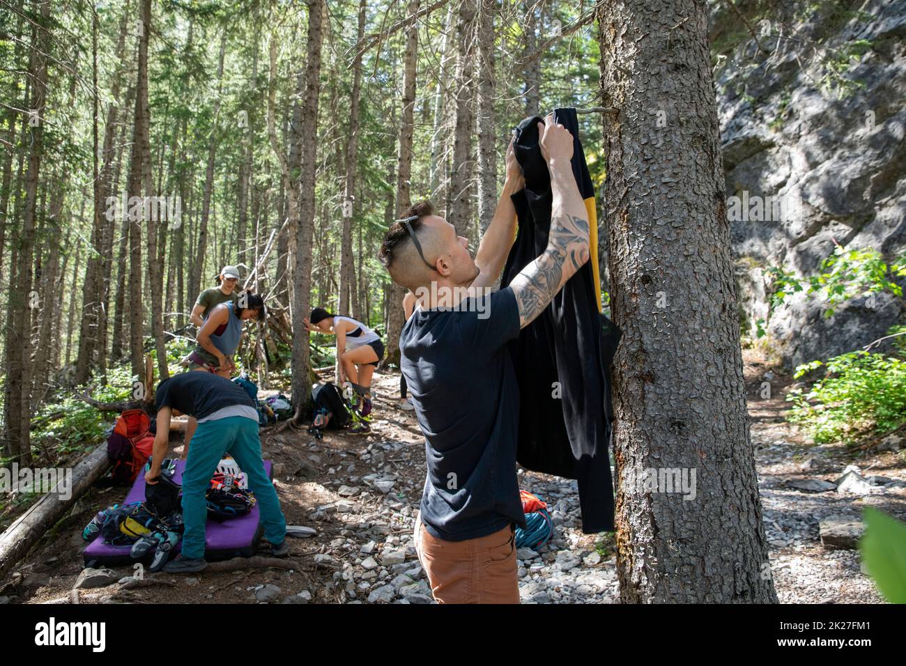 Man hanging on tree hi-res stock photography and images - Alamy