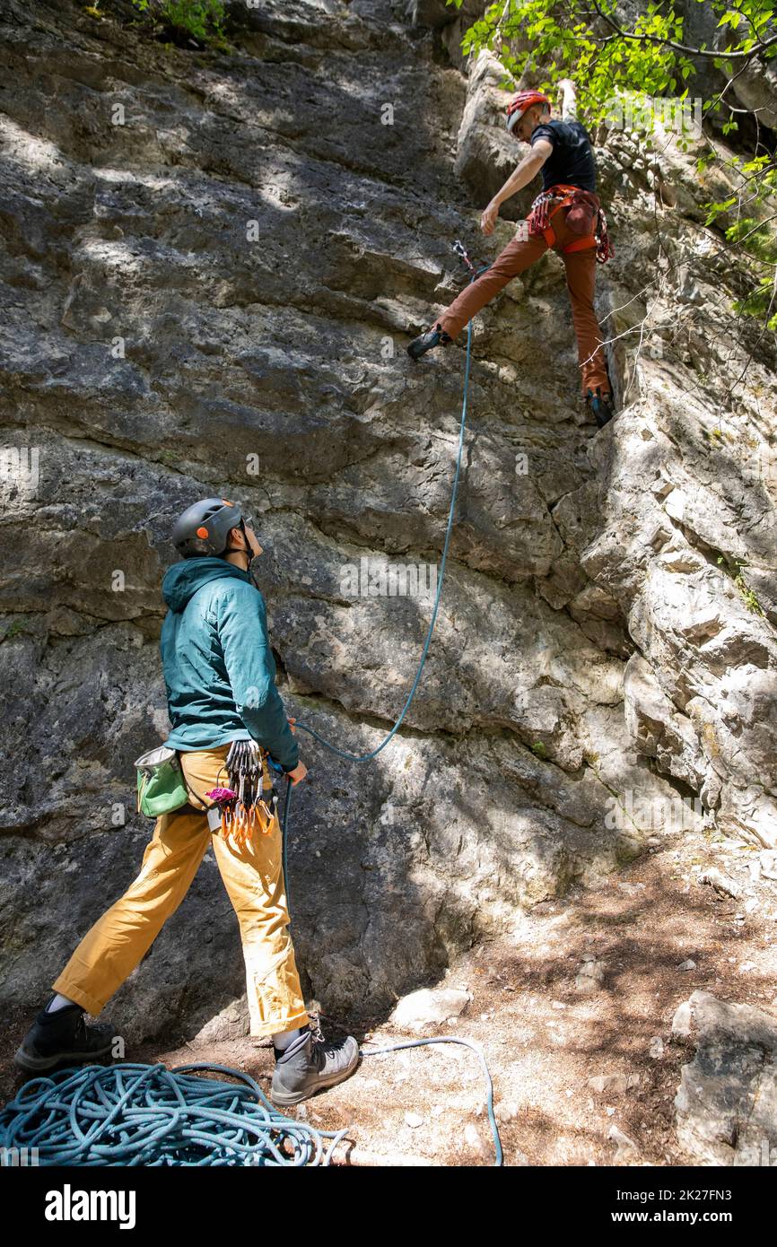 Men climbing hi-res stock photography and images - Alamy