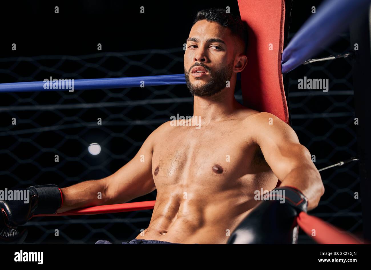 Boxing, sport and workout with a male boxer in the ring for a fight ...