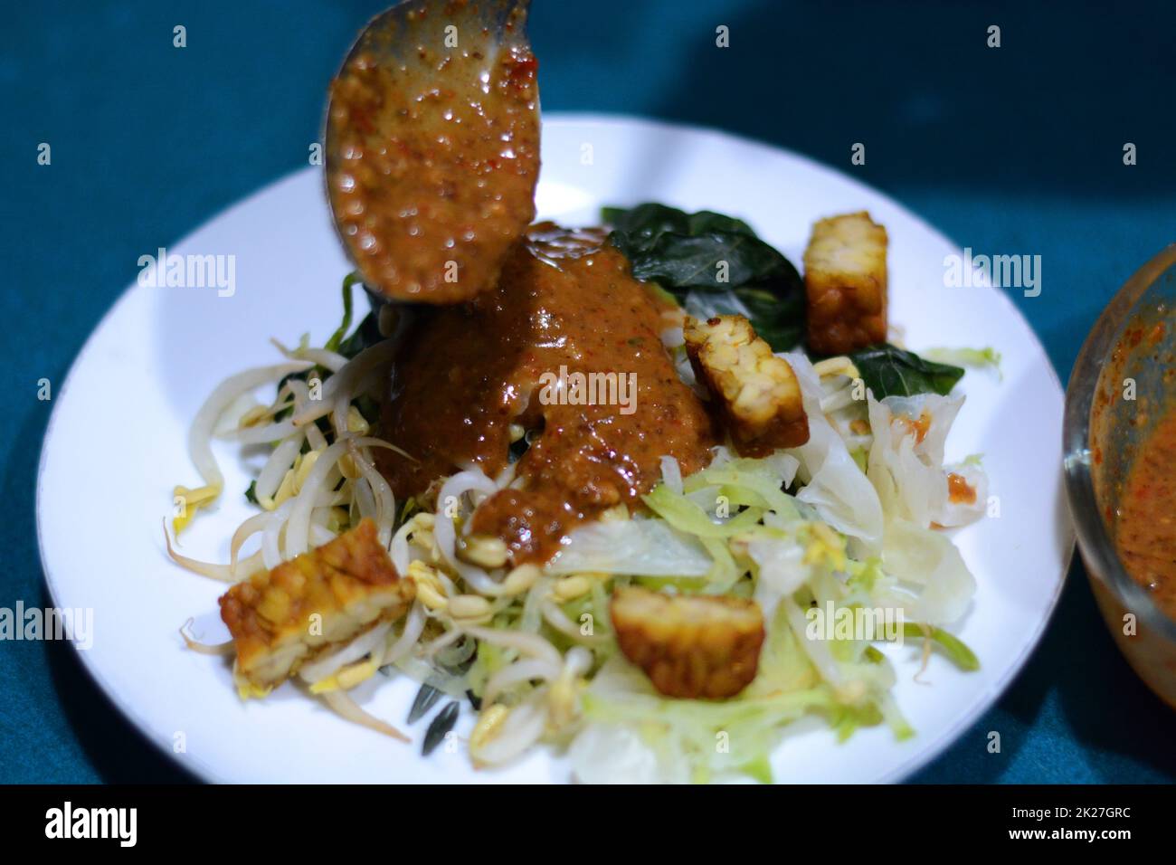 Pecel is a traditional Javanese salad with peanut sauce Stock Photo - Alamy