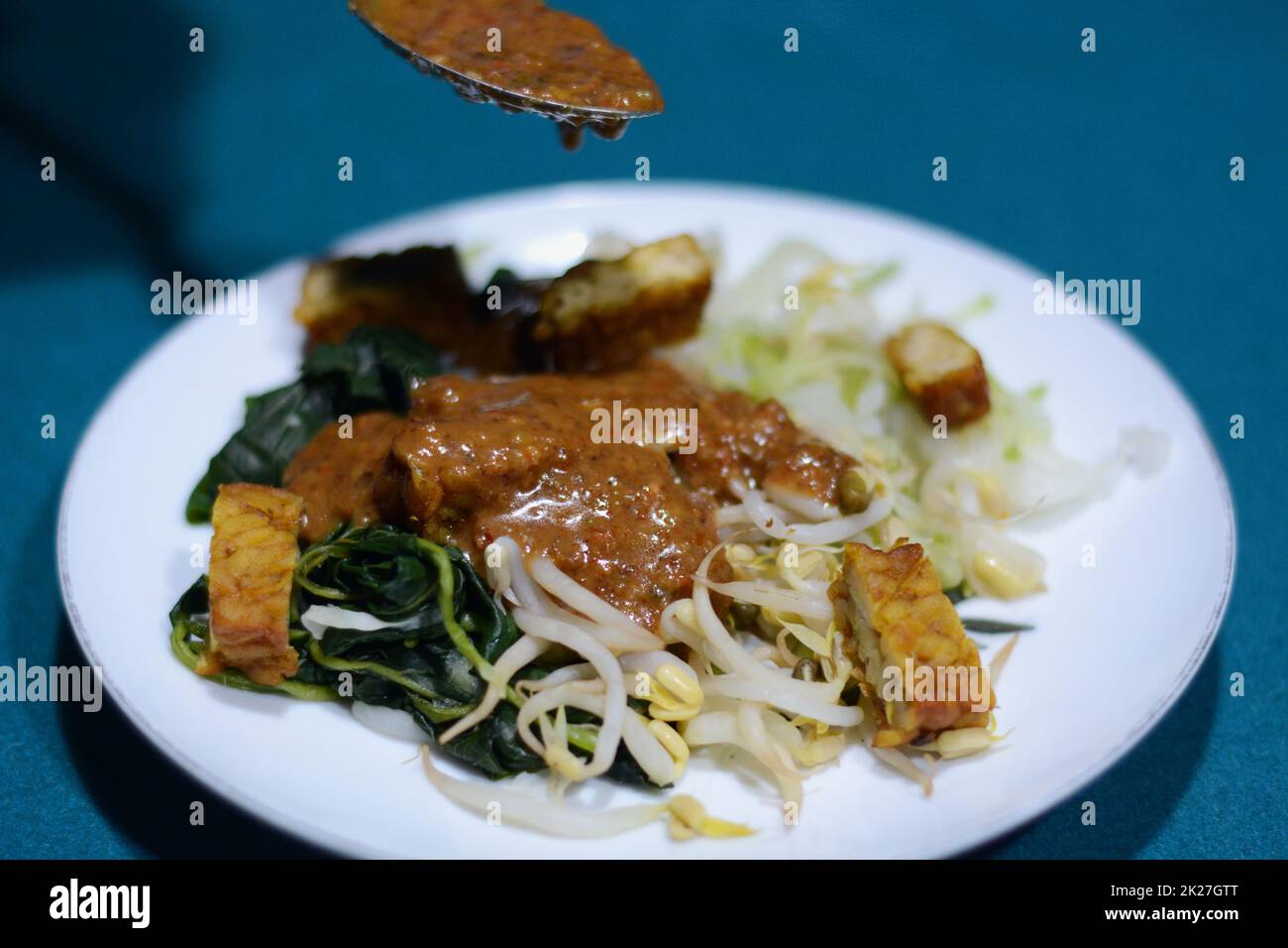 Pecel is a traditional Javanese salad with peanut sauce Stock Photo - Alamy