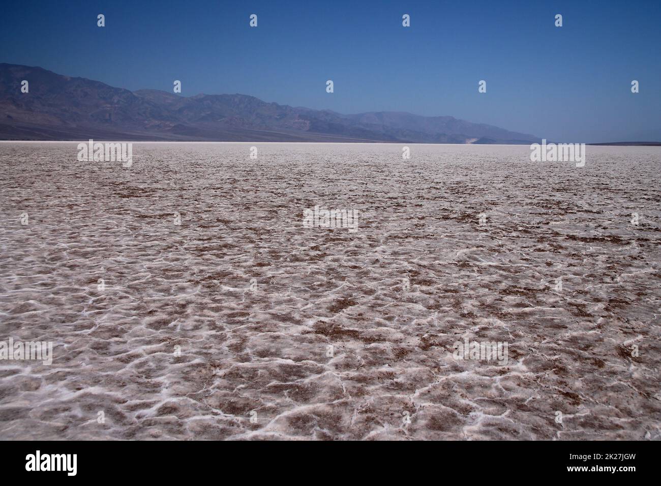 The salty snow covering the Devils Golf Course rock formation in the ...