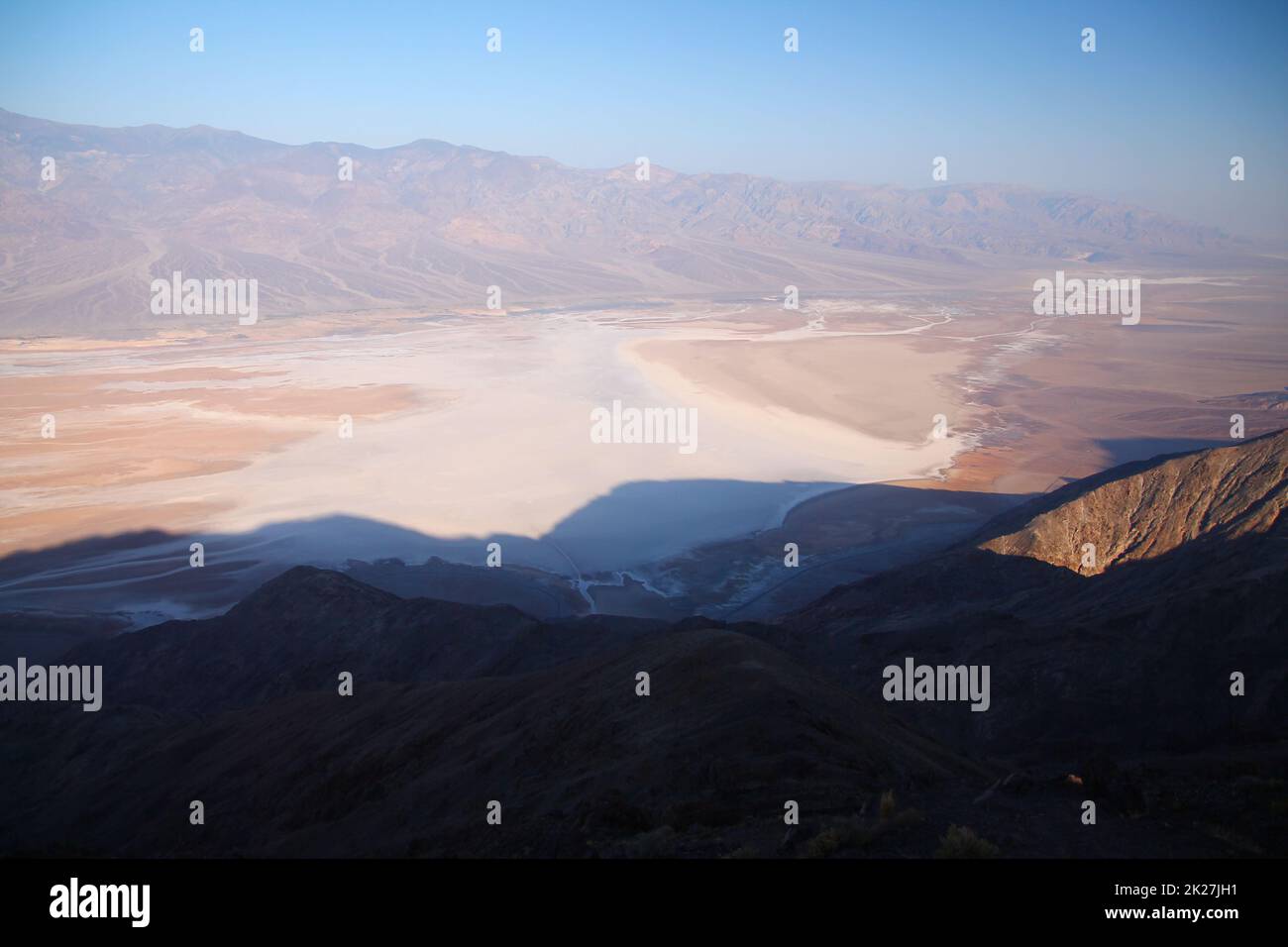 The white salt dried lake of Badwater Basin from the top of the ...