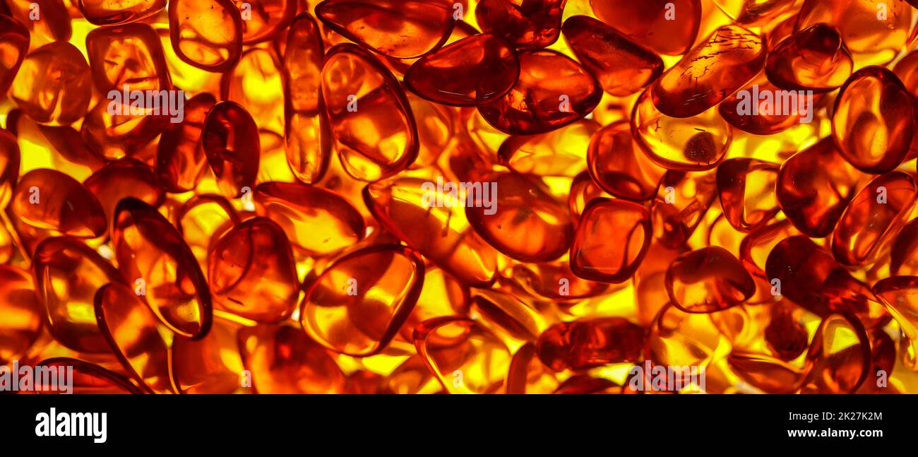 Amber in its natural form and warm color. Amber is often made into ...