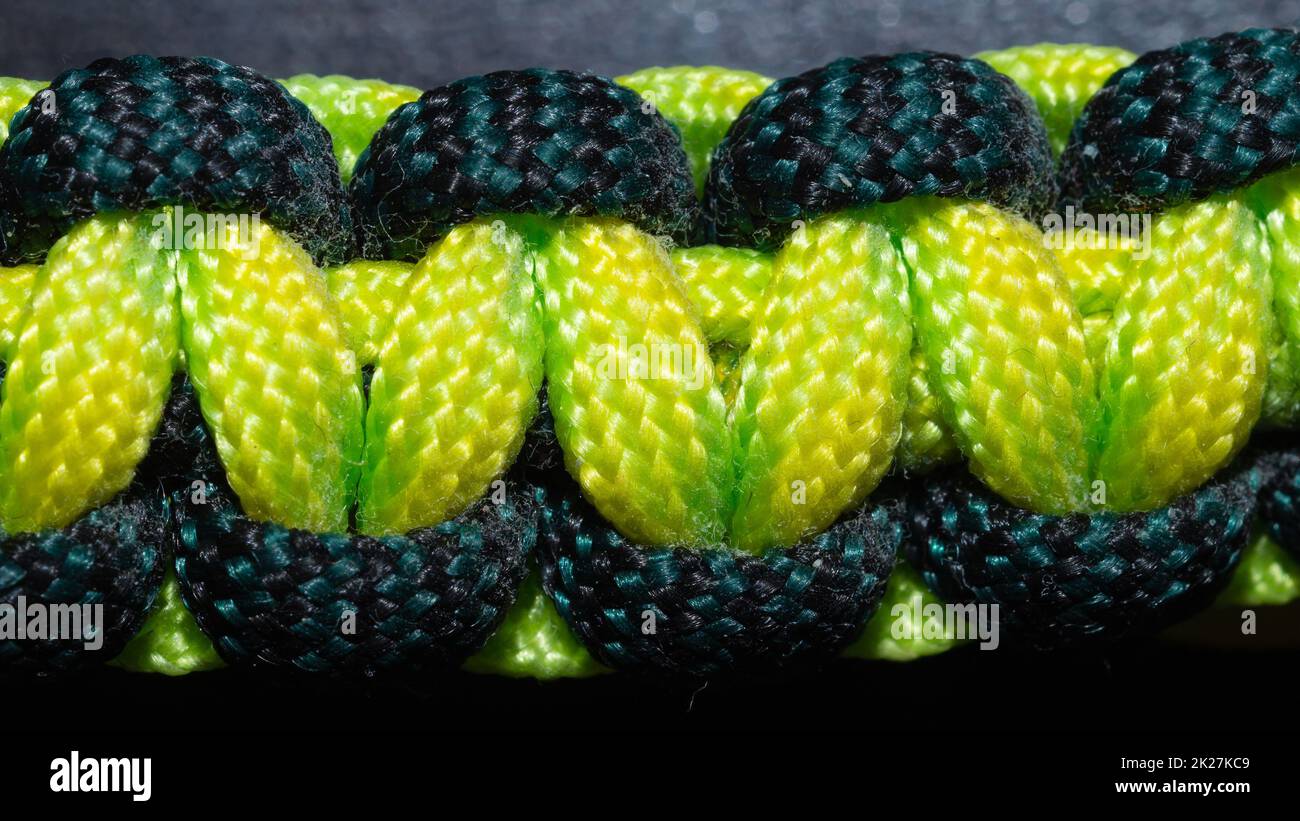 Braided paracord bracelet with knots close up Stock Photo - Alamy
