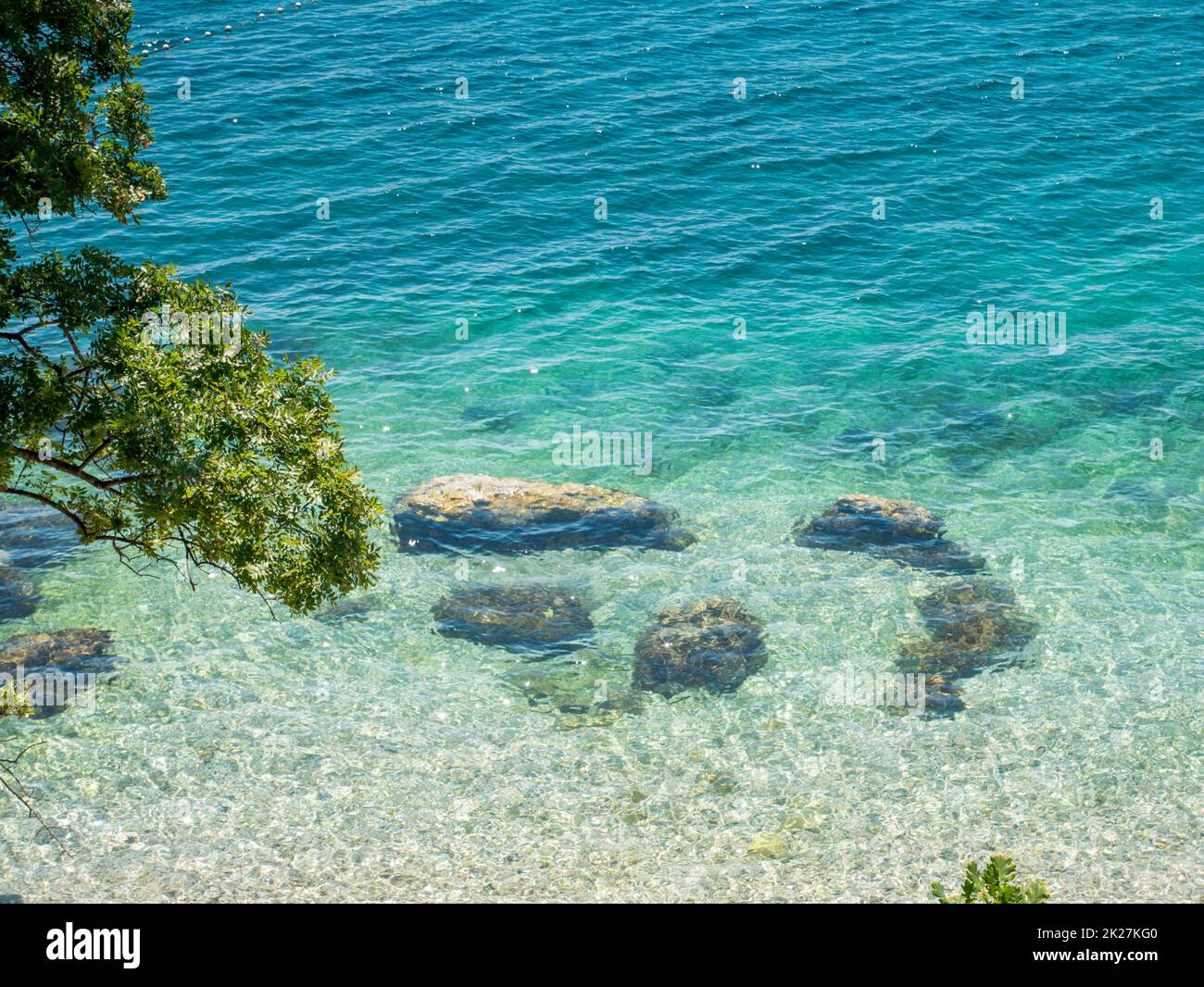 Sea, beach and green trees in Kostrena, Croatia Stock Photo - Alamy