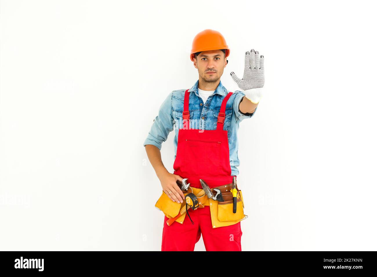 Rear view of Male Construction Worker with short black hair in uniform ...
