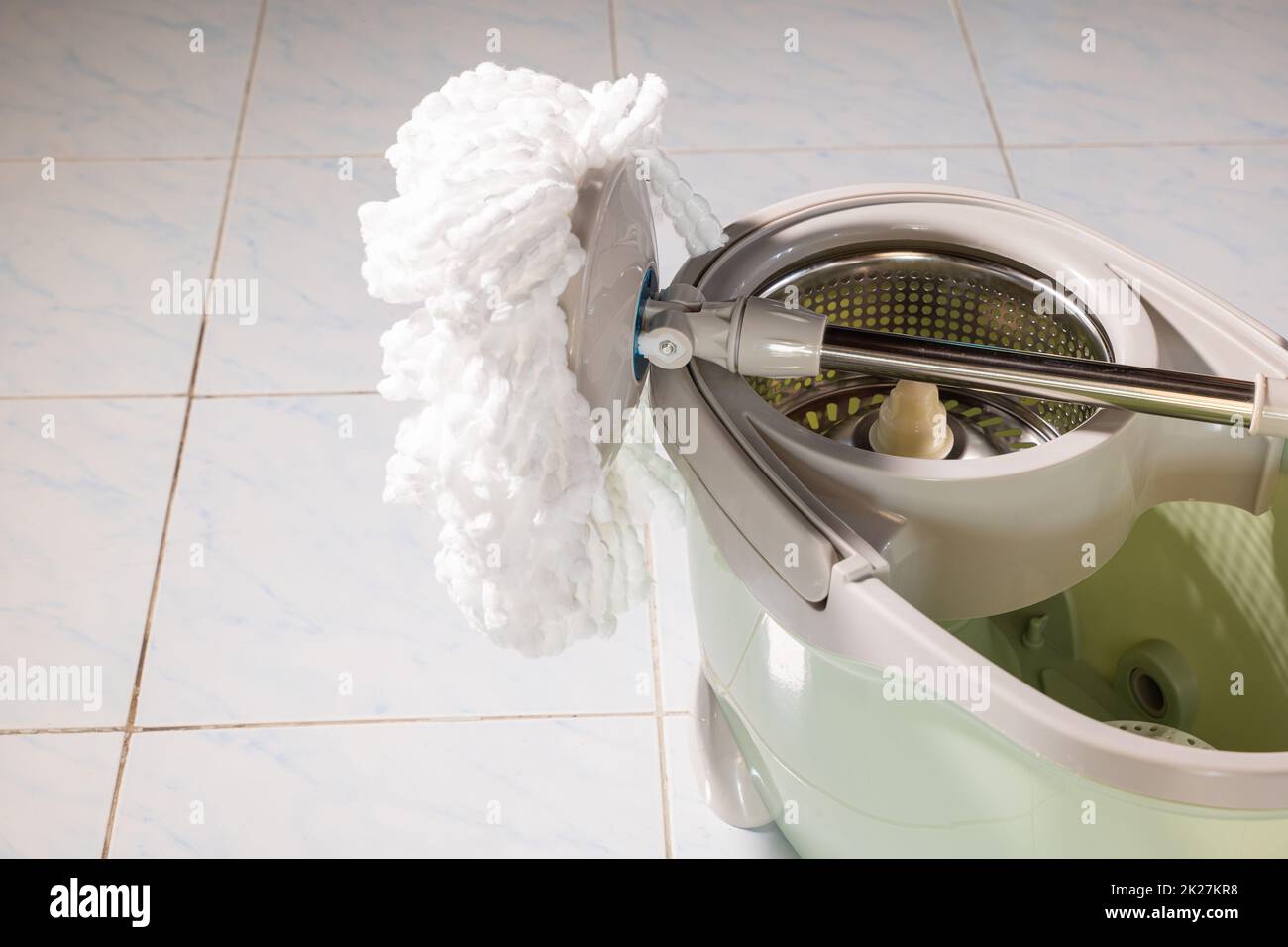 Bucket of water on her head hi-res stock photography and images - Alamy