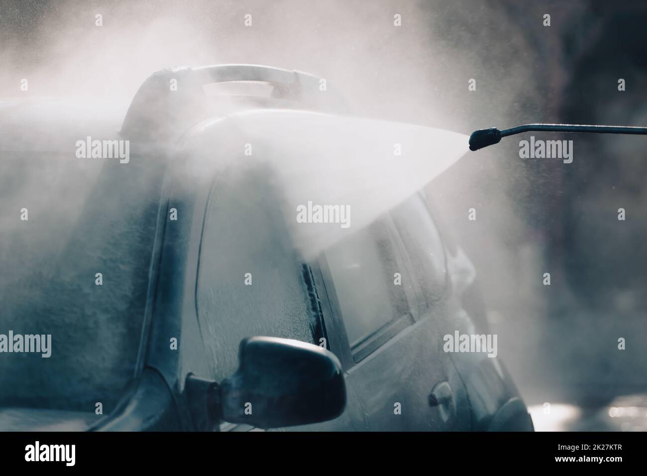 Dirty offroad car in a car wash Stock Photo - Alamy