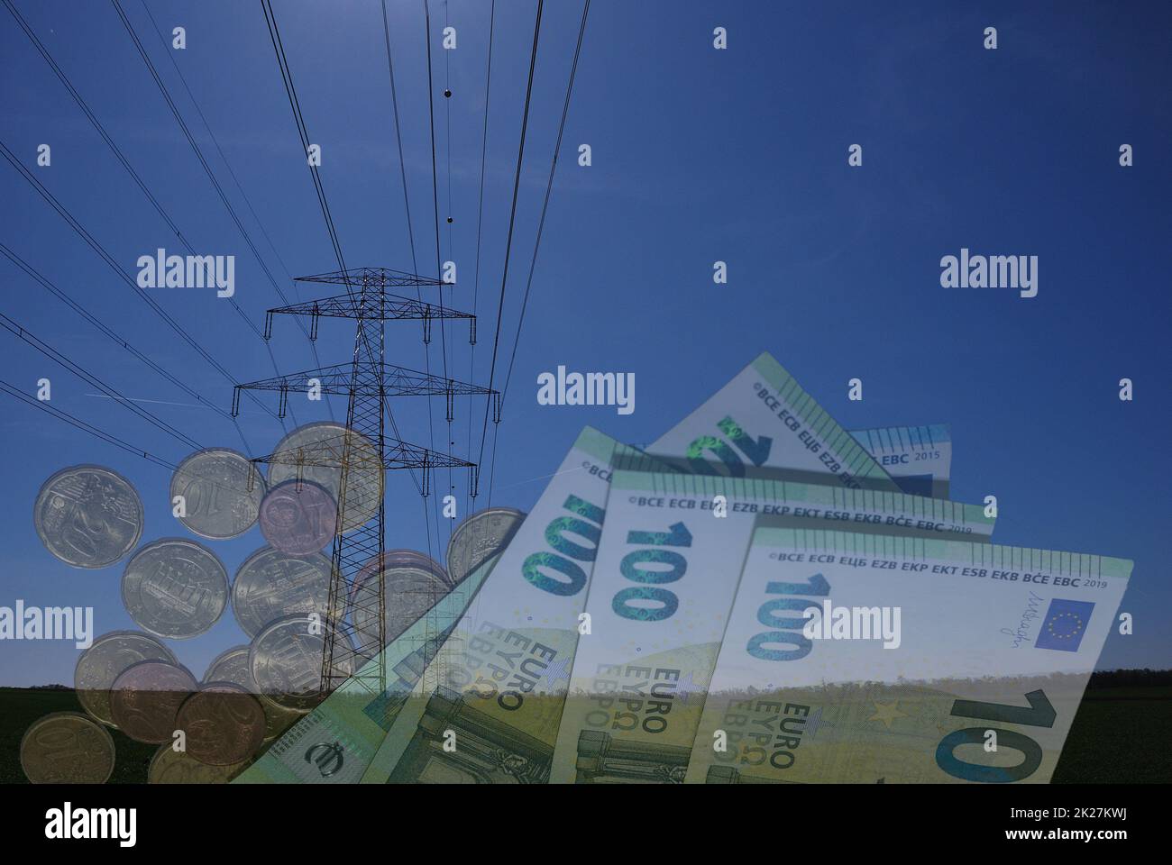 electric pylon with blue sky and green field with 100 euro bills and ...