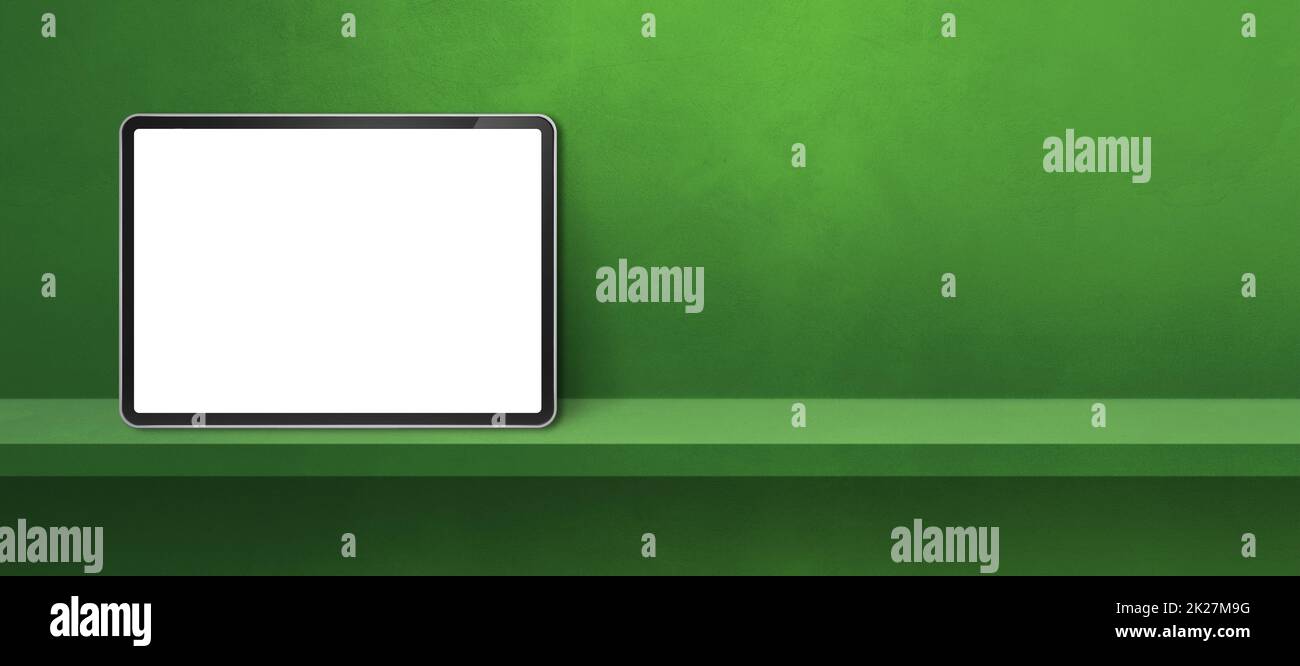 Digital tablet pc on green wall shelf. Background banner Stock Photo ...