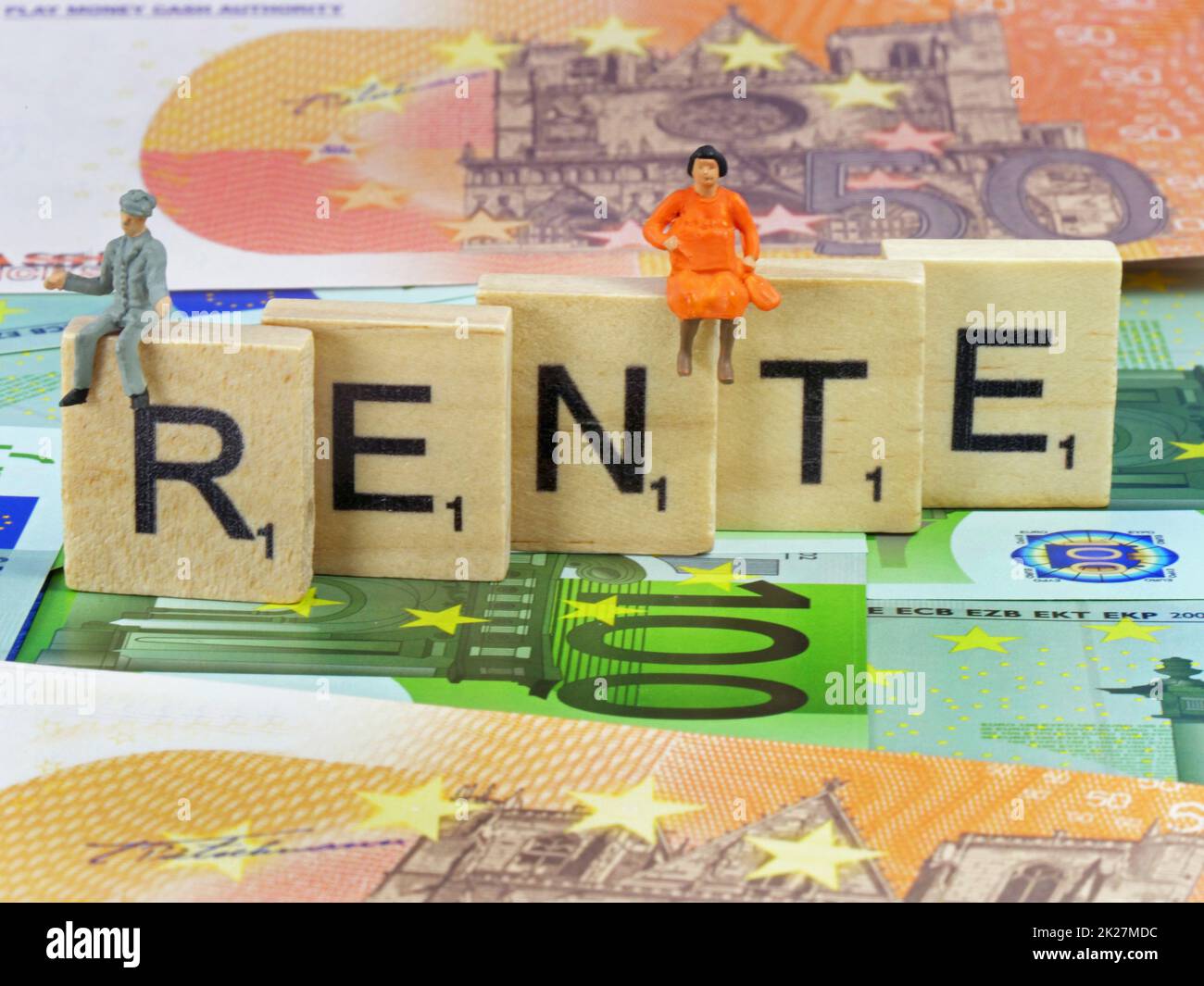 Pension as a symbolic image with euro banknotes and coins Stock Photo ...