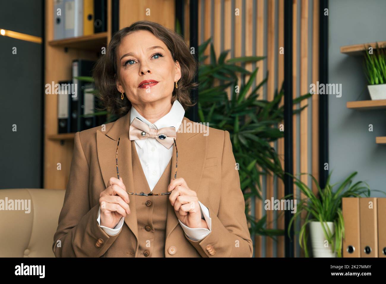 Confident stylish mature middle aged elderly woman in office. General ...
