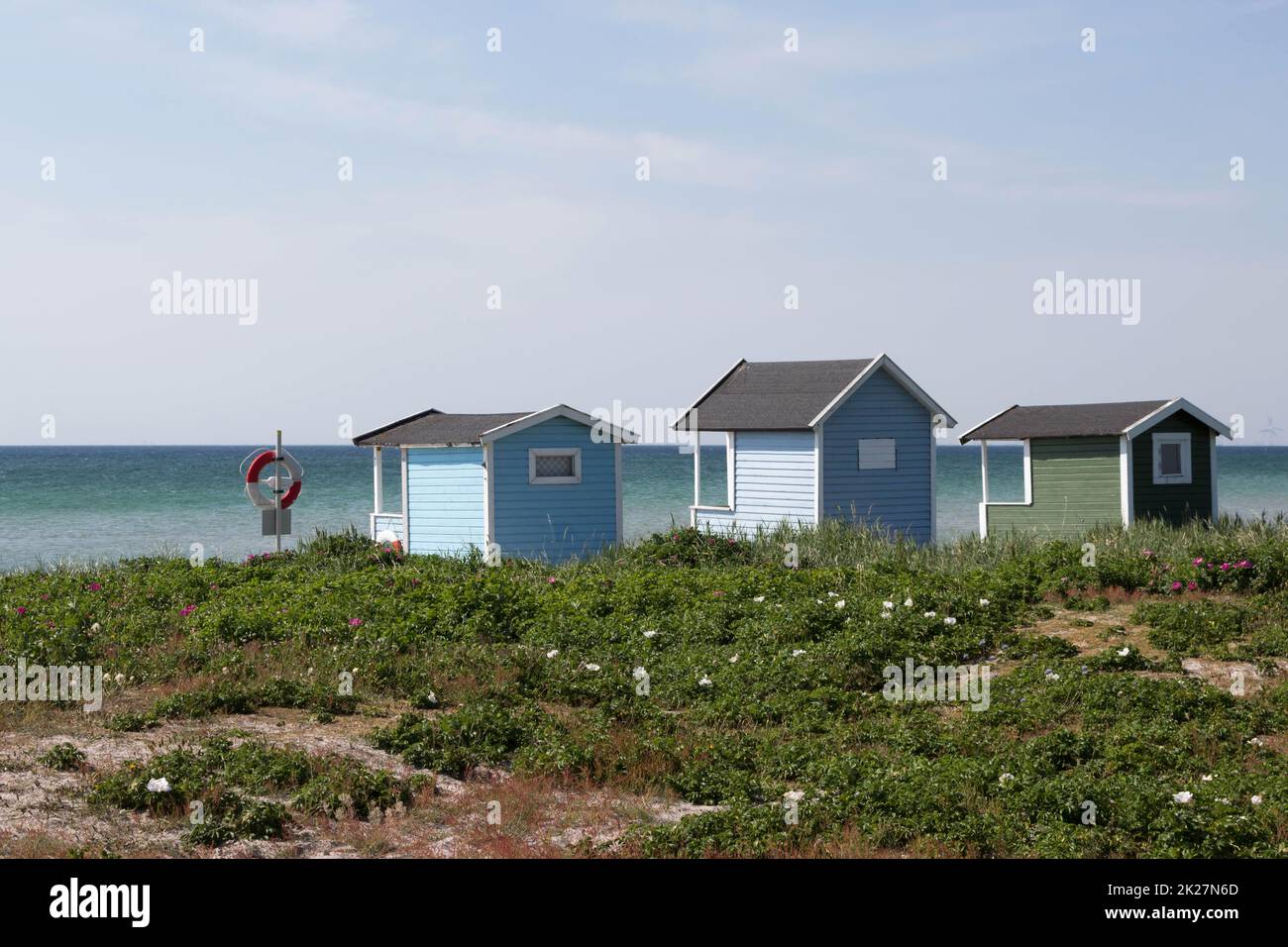 Bathing huts in front of the beach Stock Photo - Alamy