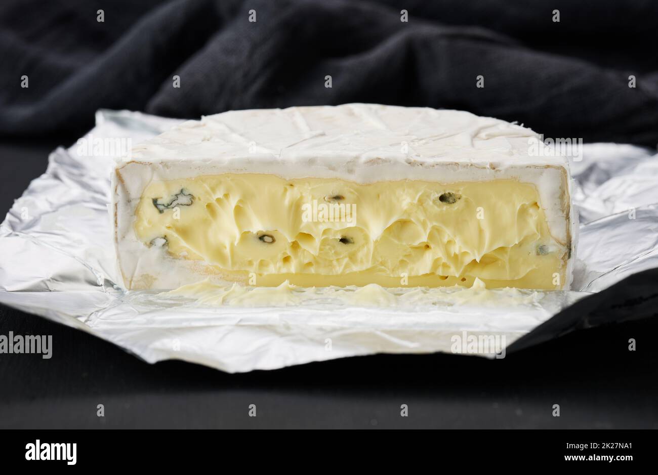 bergader blue cheese on a black board, delicious snack Stock Photo - Alamy
