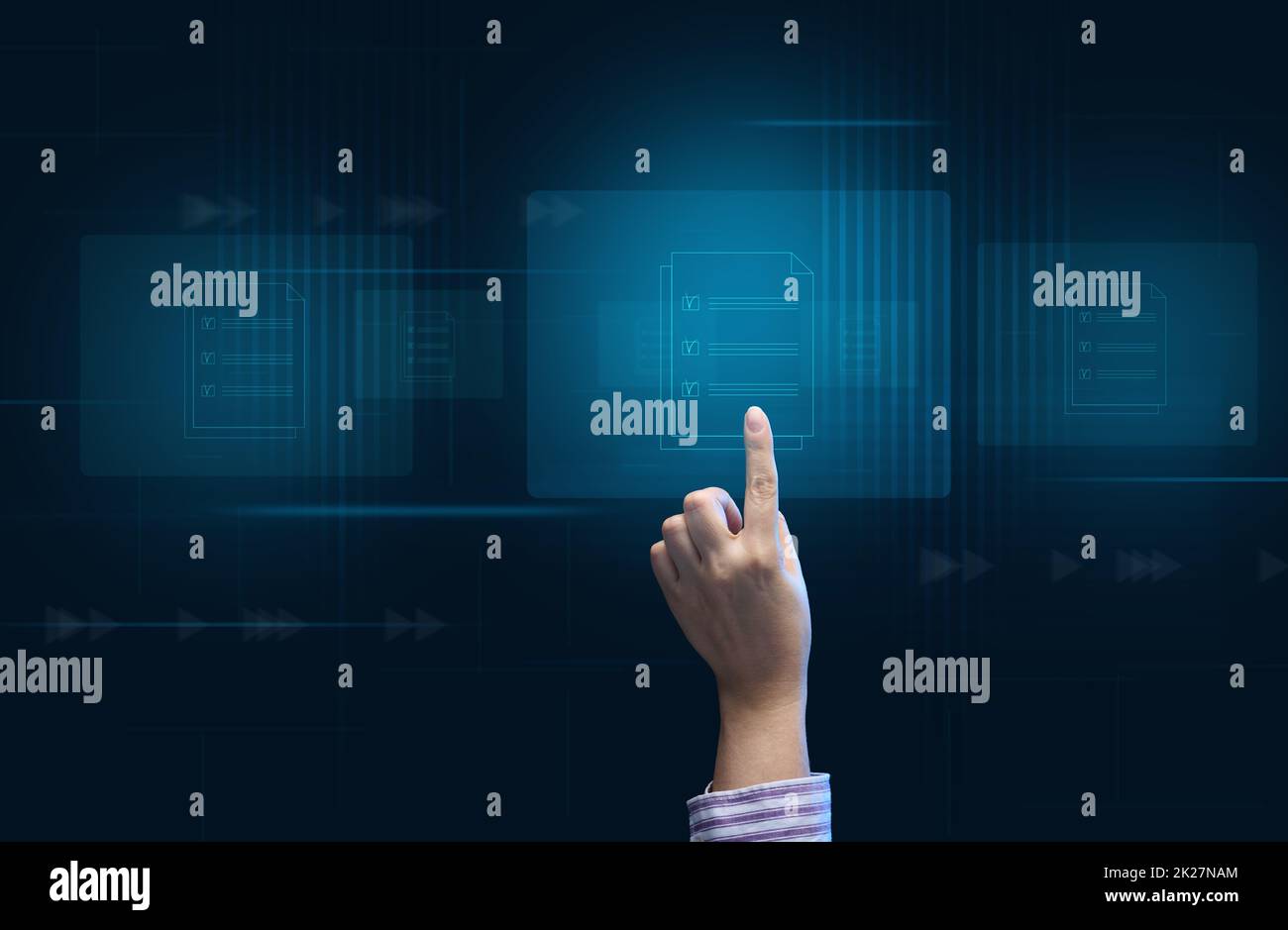 a female hand checks documents on a holographic screen. The concept of ...